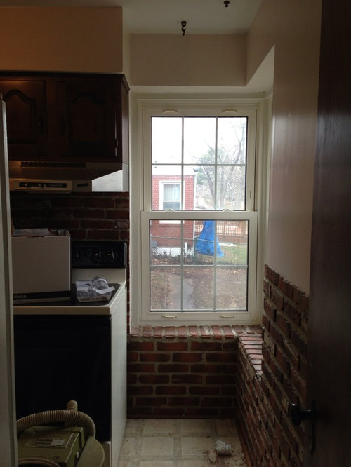 Galley kitchen w corner window