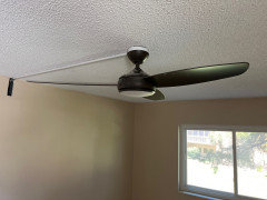 hiding ceiling fan junction box and conduit on concrete ceiling