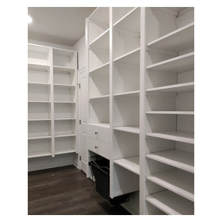 Galley Style Walk-In Master Closet in Wayne PA back wall - Modern ...