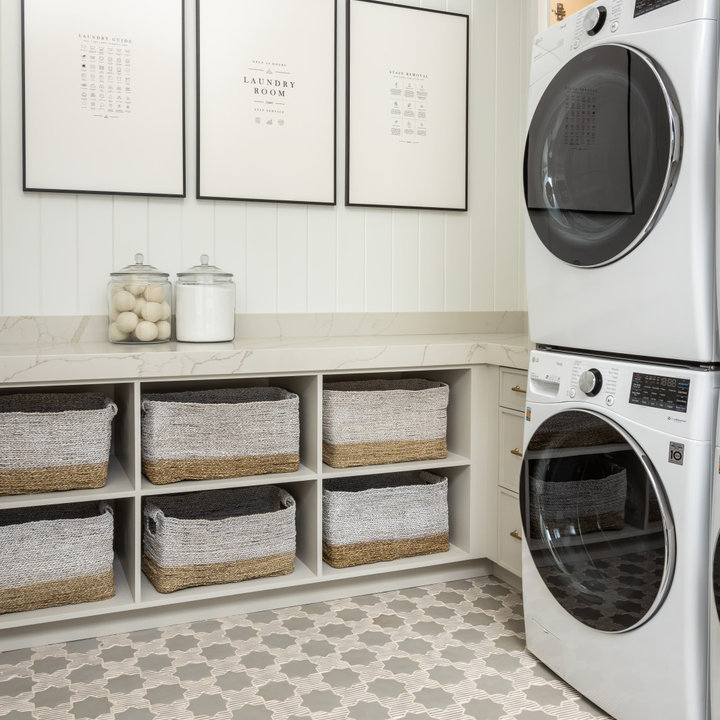 75 Beautiful Utility Room with a Stacked Washer and Dryer Ideas and ...