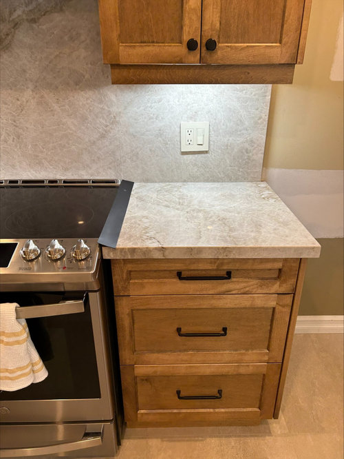 Wall Paint colors for Taj Mahal Quartzite with Medium Brown Cabinets ...