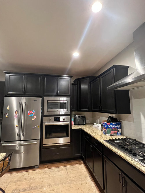 How to take my staggered cabinets to the 9ft ceiling?