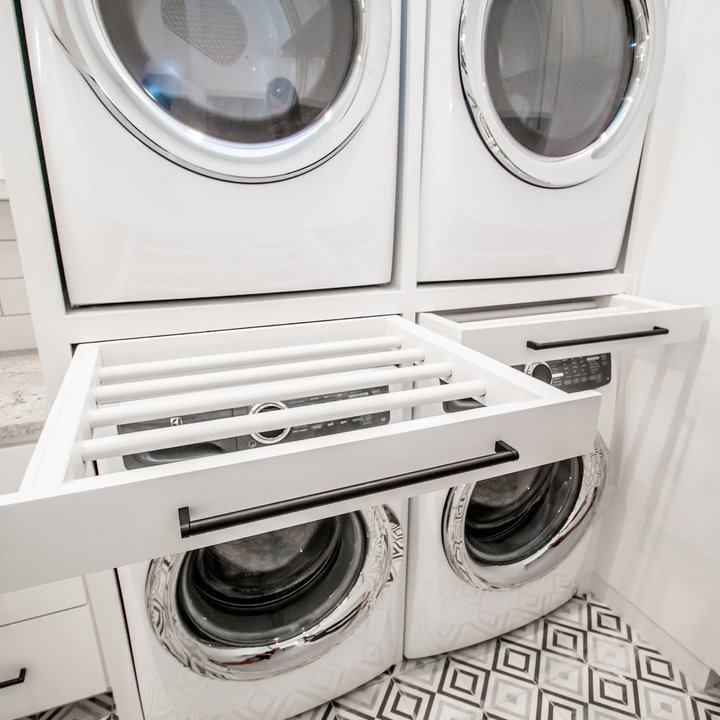 75 Beautiful Utility Room with a Stacked Washer and Dryer Ideas and ...
