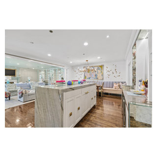 Elegant Eclectic Home Bar with Marble Island and Luxe Metallic Accents ...