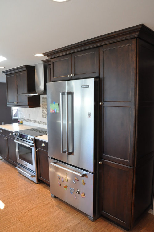 Fix a chopped up kitchen space into a dream kitchen for a family.