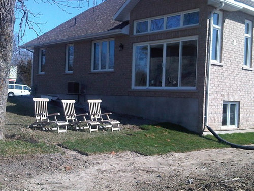 Need landscape advice for sloping corner lot.