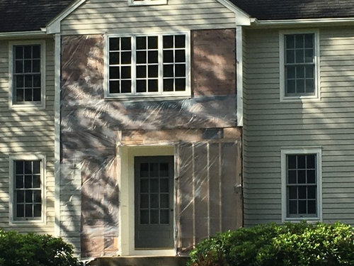 Portico design for a traditional colonial, with recessed door