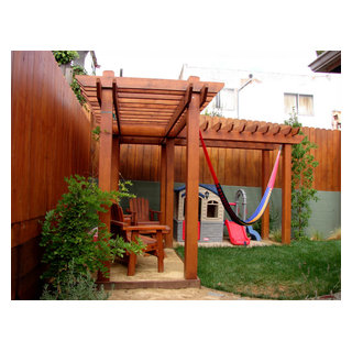 L-Shaped Pergola with Hammock over Playhouse and Seating - Transitional ...