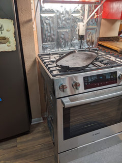 Need ideas to cover exposed side of Bosch slide-in range. No OEM part.