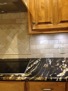 Backsplash recommendations for black fantasy leathered granite?
