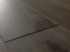 Help! Sharp edges on floor tiles after install.