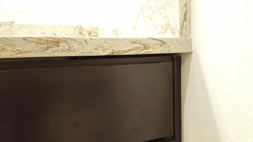 Gap between bathroom cabinet and stone countertop