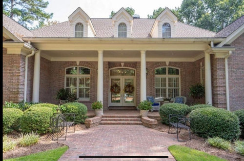 Help! What roof and exterior colors for pink brick?