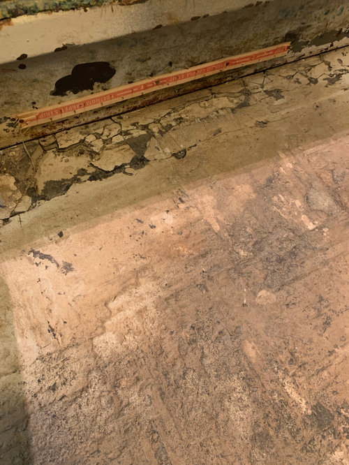 Average cost for leveling a cement subfloor, or any advice?