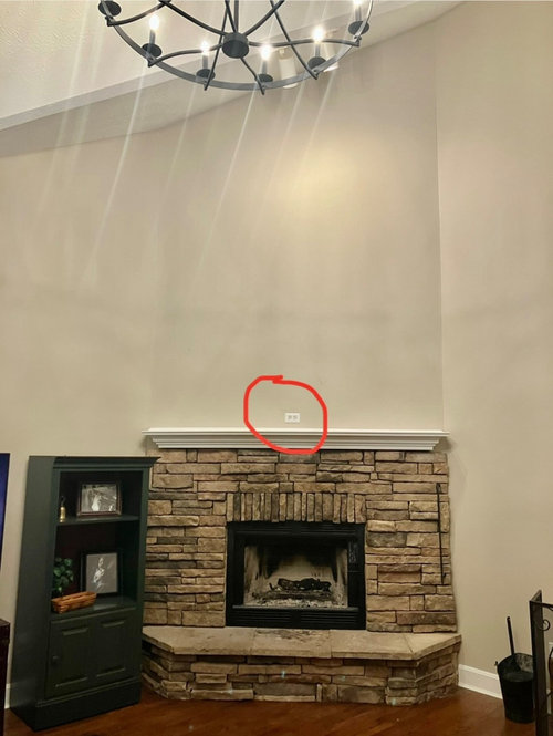Help me hide/get rid of this outlet above my fireplace. | Houzz Forum