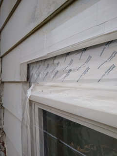 Window protrudes past exterior trim, what to do?