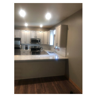 Modern Kitchen Remodel Done in a Morning Dew Color - Modern - Kitchen ...