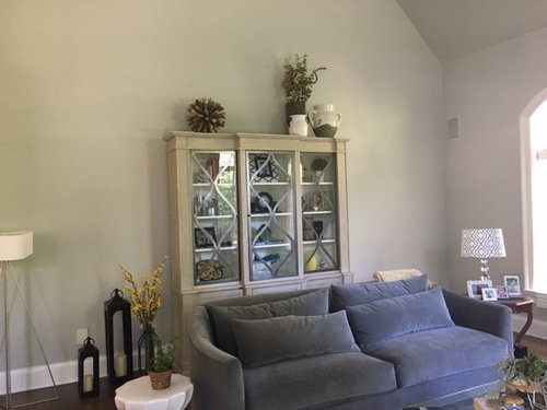 Need ideas of what to place on either side of a bookcase..