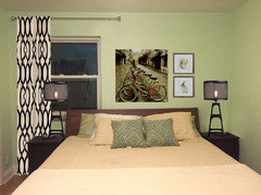 Window off center behind bed