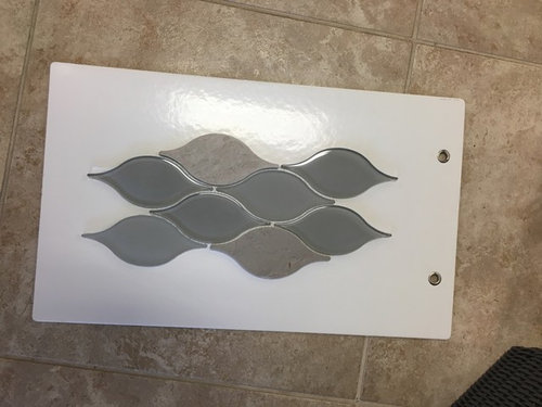Using curvy tile for backsplash. how to trim at ends?