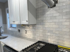 Alpine Valley countertops, off white cabinets.