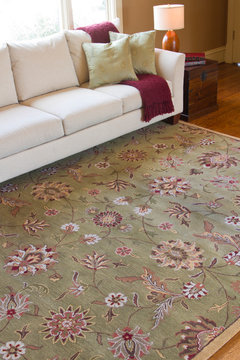 Maroon carpet creating roadblock in vision for decorating