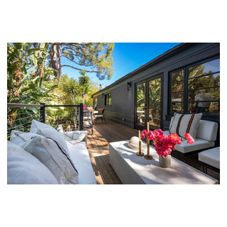 Celebritity IOU backyard deck featuring Spiced Teak composite decking ...