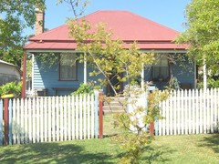 Exterior colour ideas to go with a red colorbond roof please?