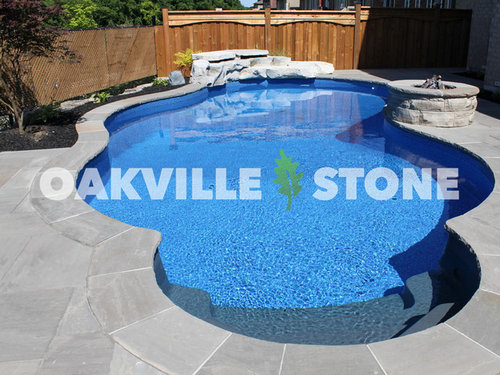 Paving stones around curved-edge pool