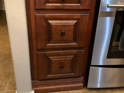 Flooring with cherry wood cabinets