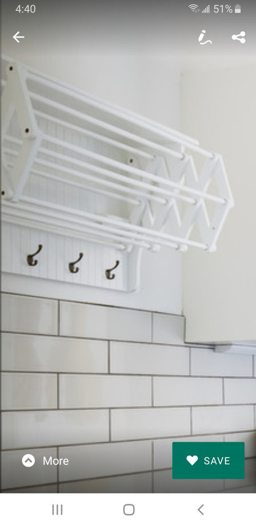 Best hanging system for this laundry room wall?