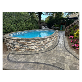 Above Ground Pool Wrapped with Stone Veneer and Cambridge Paver Patio ...