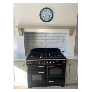 Traditional cream country cottage style kitchen with white worktops ...