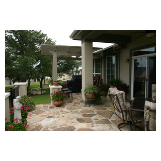 Chocolate / brown flagstone extension w/ stucco seatwalls and columns ...