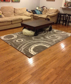 Coffee table vs rug placement