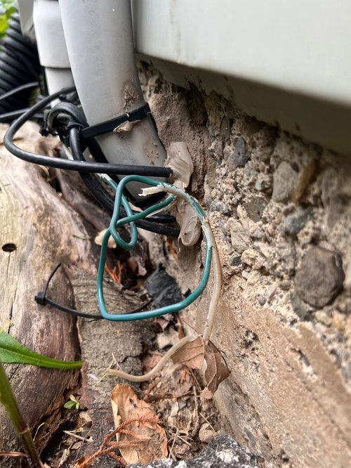 Best way to waterproof hole for electrical wires in exterior concrete