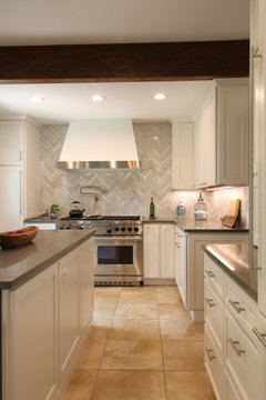 White kitchen cabinets with ugly tan tile floor?