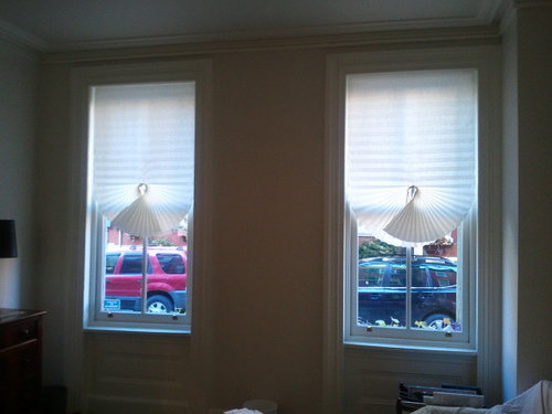 Stinky smelling room darkening shades. Help.