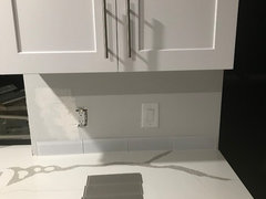 need help deciding on which backsplash looks best with calacatta laza