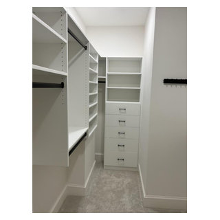 Walk-in Primary Closet with Shelving, Drawers, Hang-space, and a Belt ...