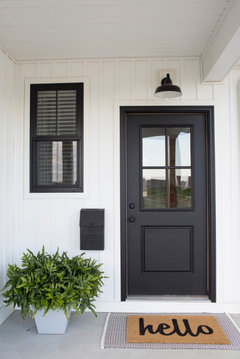 Need help on style exterior light to install above door.