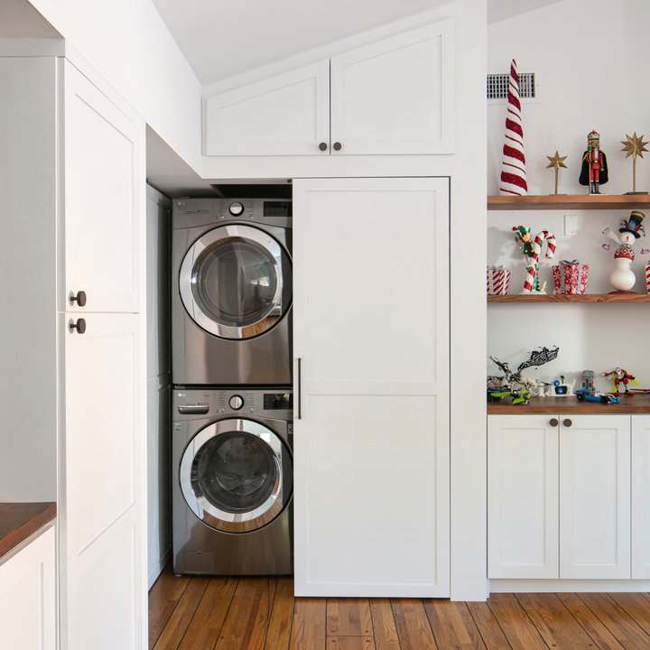 75 Beautiful Utility Room with a Stacked Washer and Dryer Ideas and ...