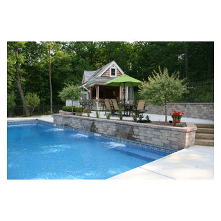 Raised Pool Wall Over Bench with Waterfalls - Pool - Milwaukee - by ...