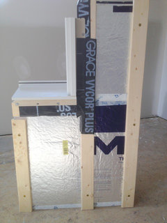 Installing siding on a shipping container