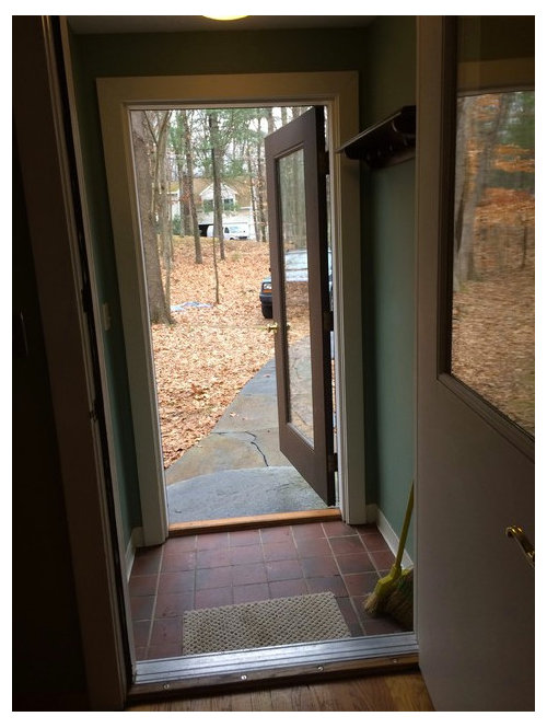 Window covering for glass front door and vestibule