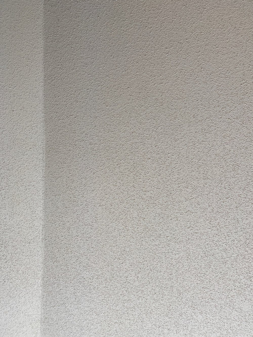 textured and smooth/ flat ceilings in same house