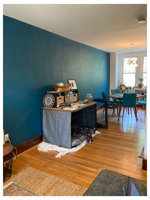 Help designing one long, windowless wall that spans two rooms?