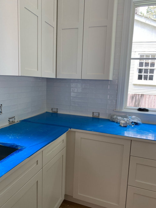 alabaster cabinets and white subway tile?