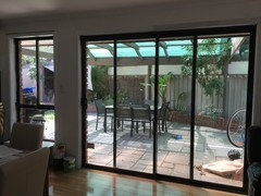 Primrose window frames and charcoal grey floor tiles | Houzz AU