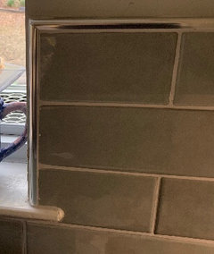What to do about bad backsplash tile installation?